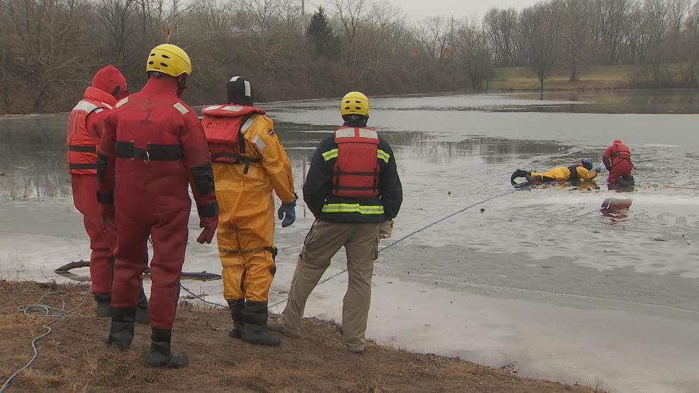 Firefighters practice ice rescue techniques as temperatures warm, ice ...